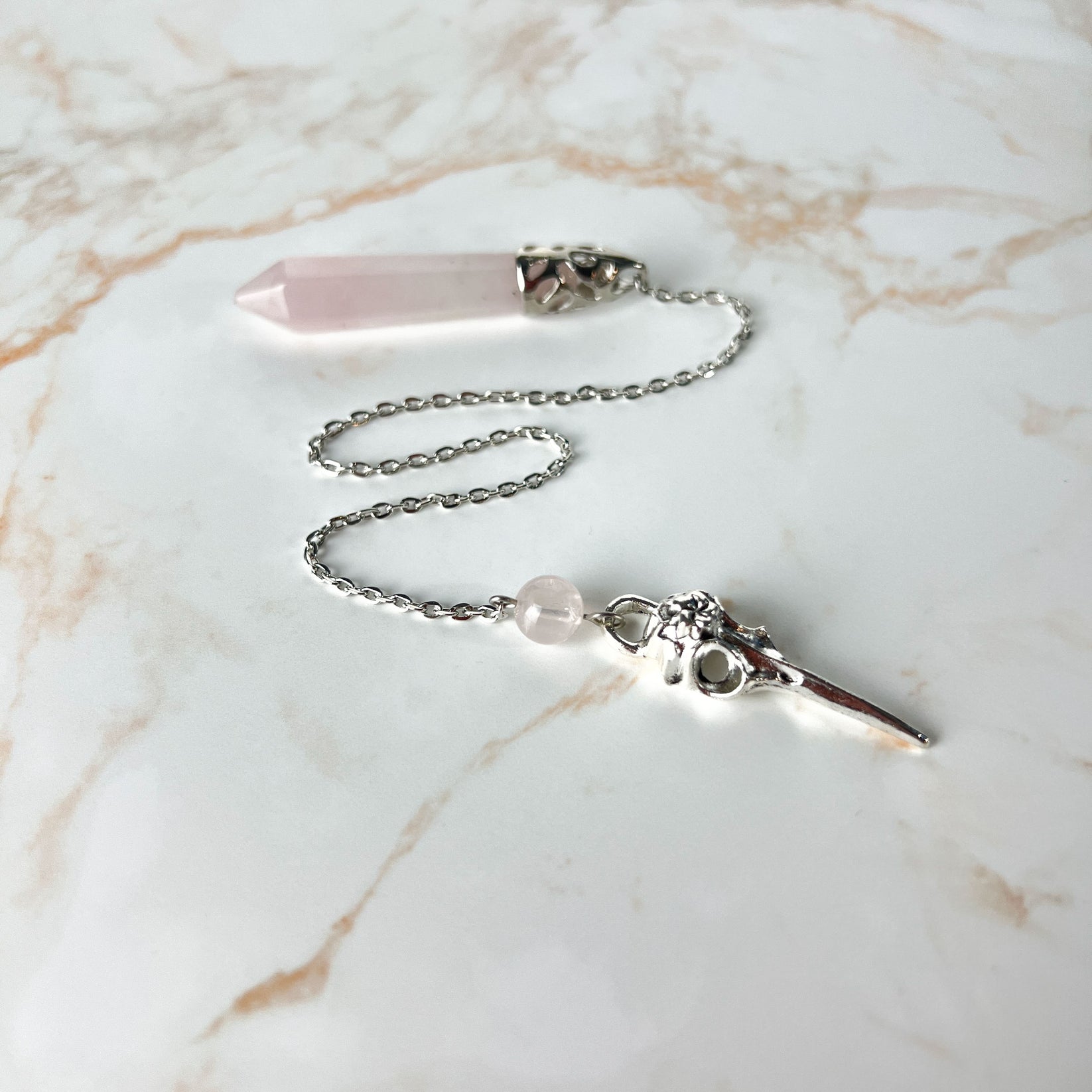 Bird skull dowsing pendulum, multiple gemstones – Baguette Magick