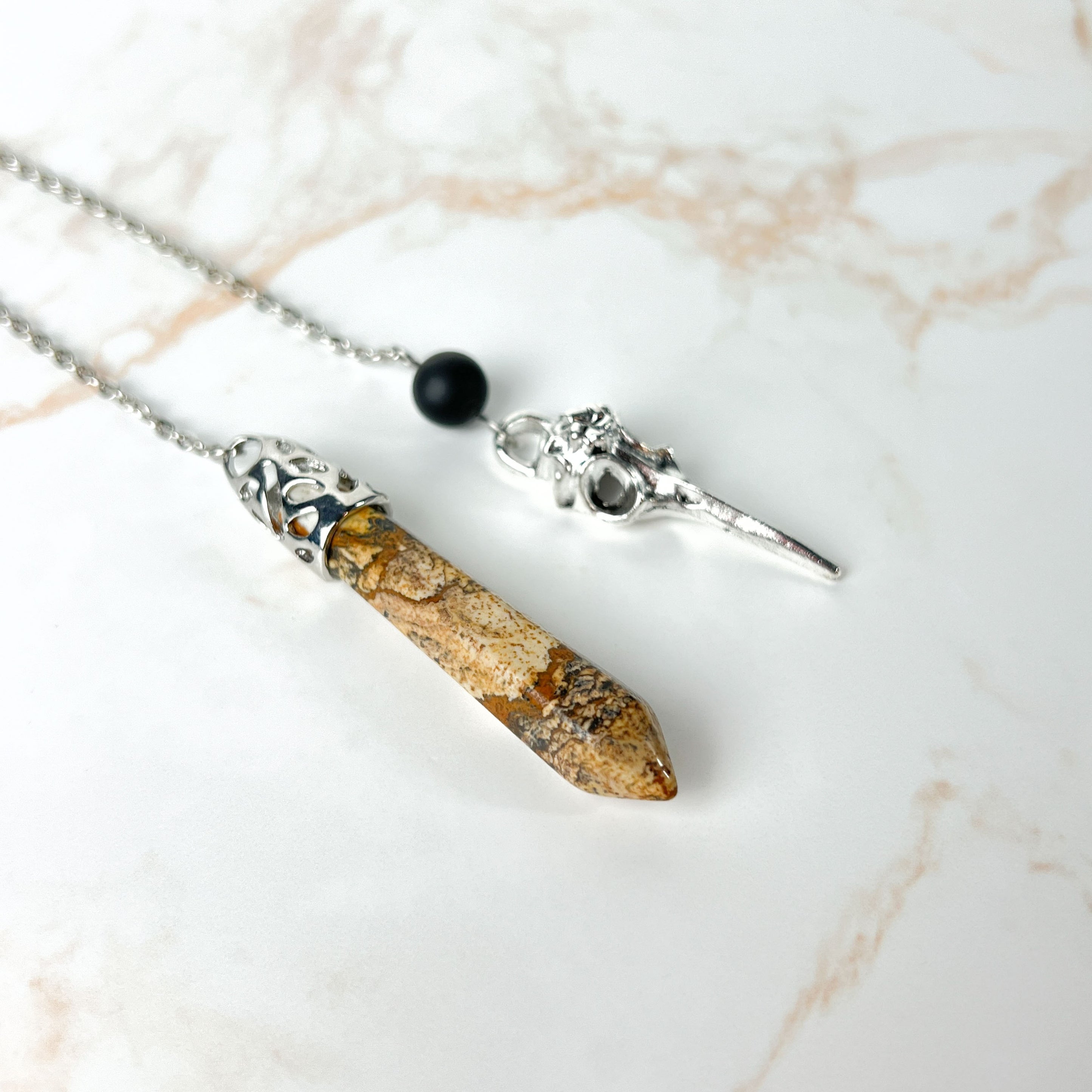 Bird skull dowsing pendulum, multiple gemstones – Baguette Magick